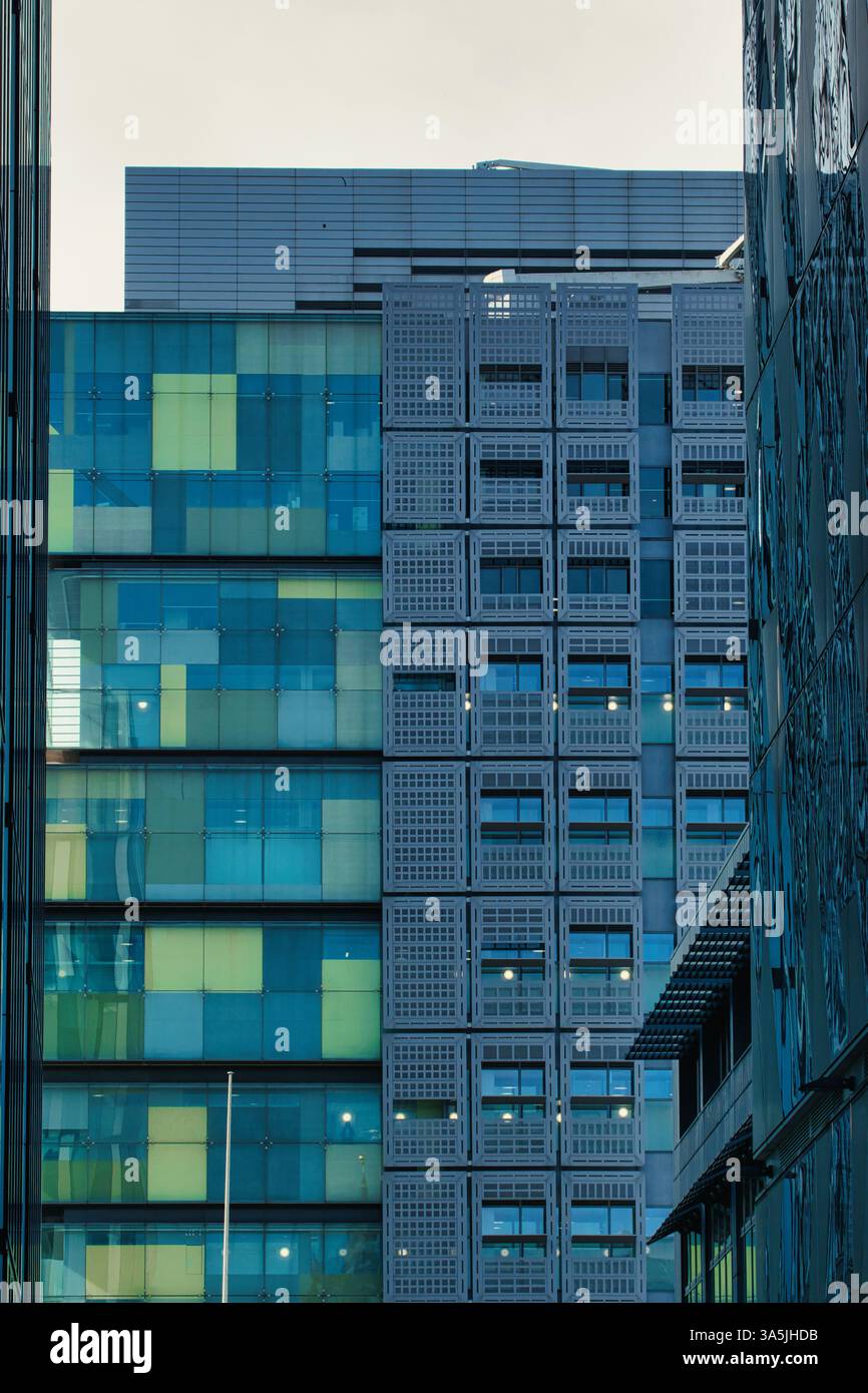 Architectural view of multiple buildings with varied facade designs and ...