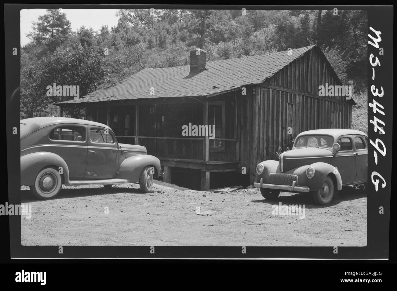 A photograph of a house located in a mining community, captured in 1946 ...