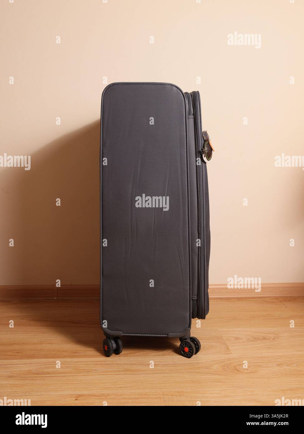 The Compact Gray Suitcase for Travel offers a versatile luggage ...