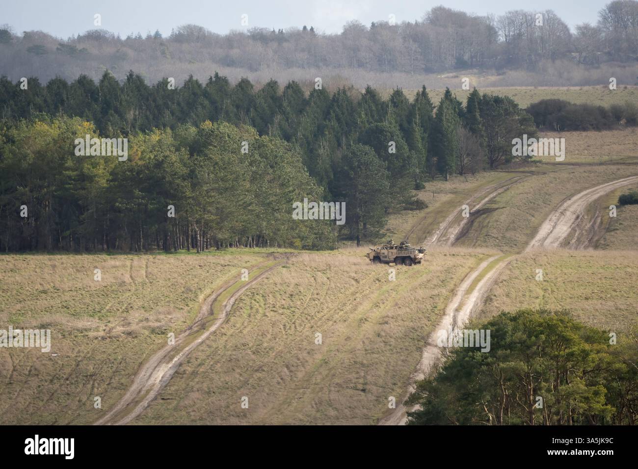 British army Supacat Coyote 6x6 moving at across countryside Stock ...