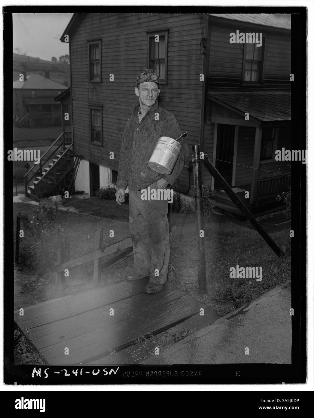 A miner is pictured at work in H. C. Frick Coke Company's National #3 ...