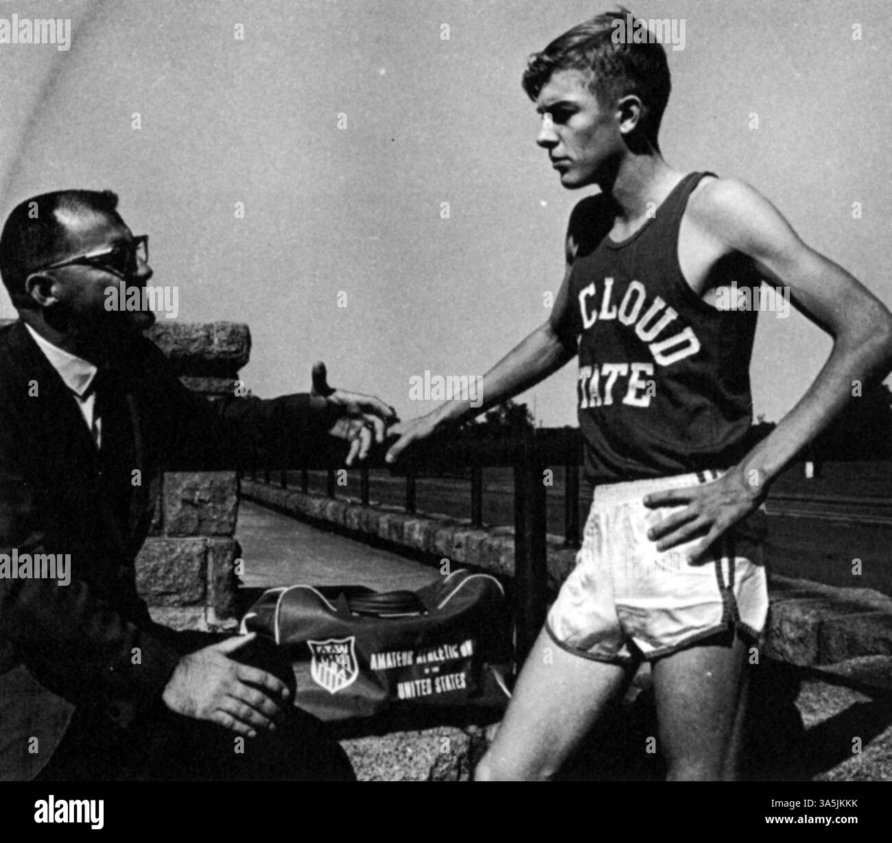 Cross country coach Bob Tracy with runner Van Nelson, who competed as a ...