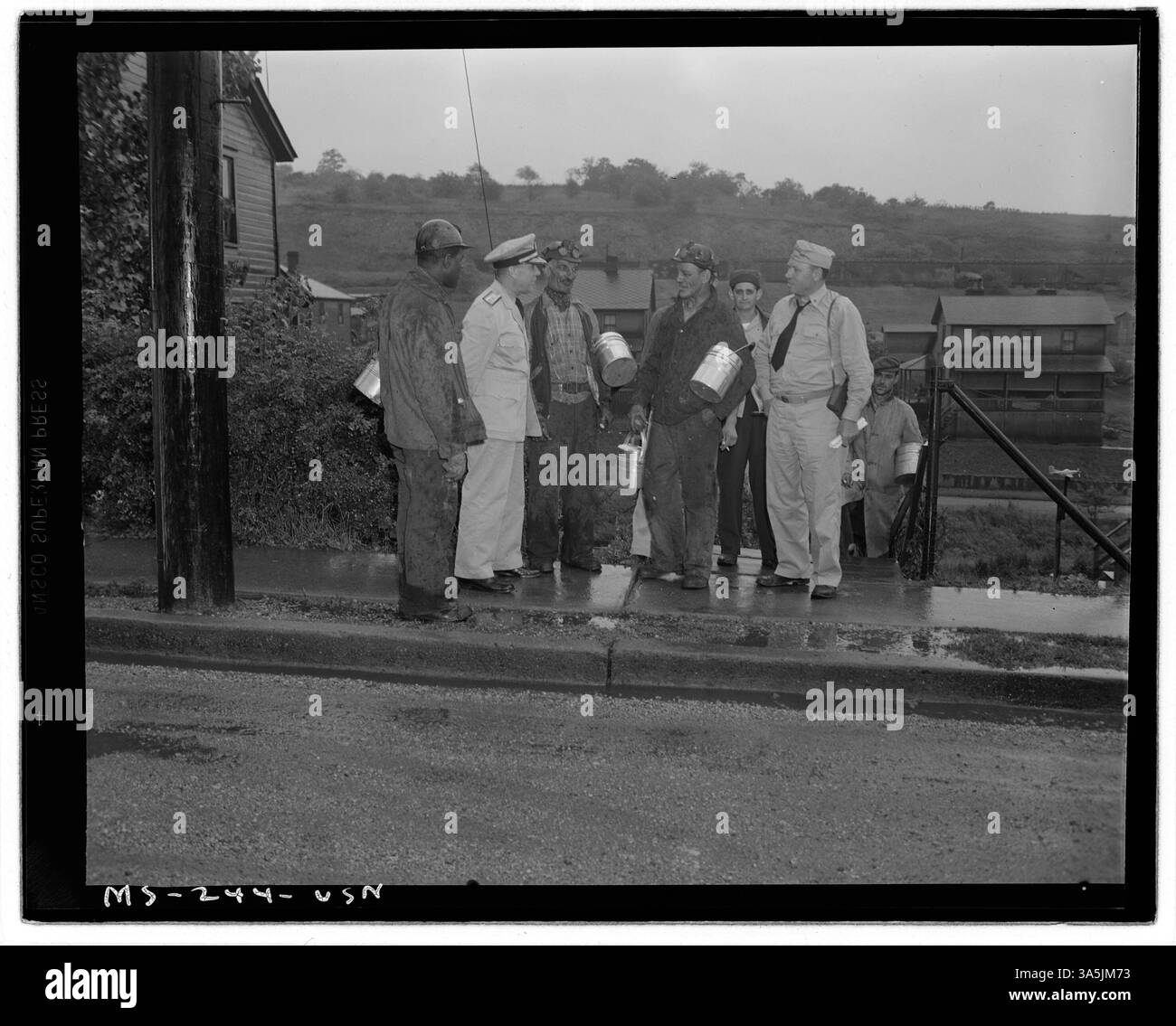 Commodore Dickman and Commander Amberson engage with miners returning ...