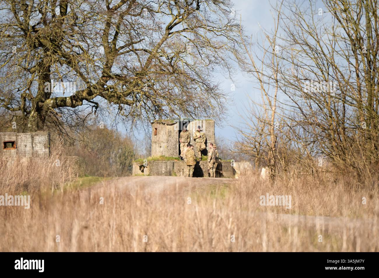 British army soldiers gathered by a concrete pillbox Stock Photo - Alamy