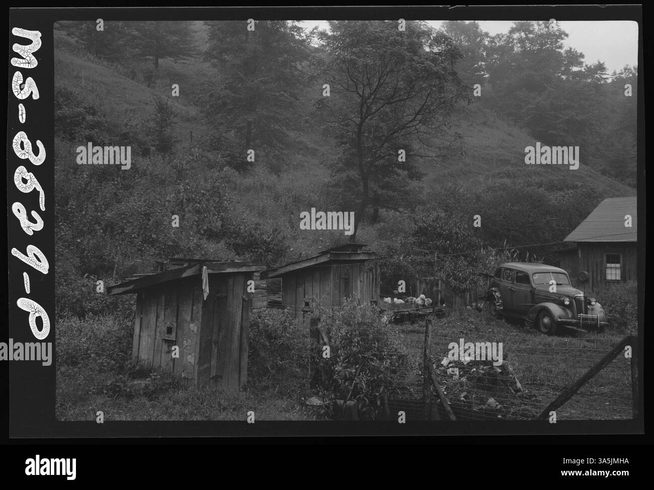 A photograph showing the back of house #2 at Utilities Coal Company’s ...