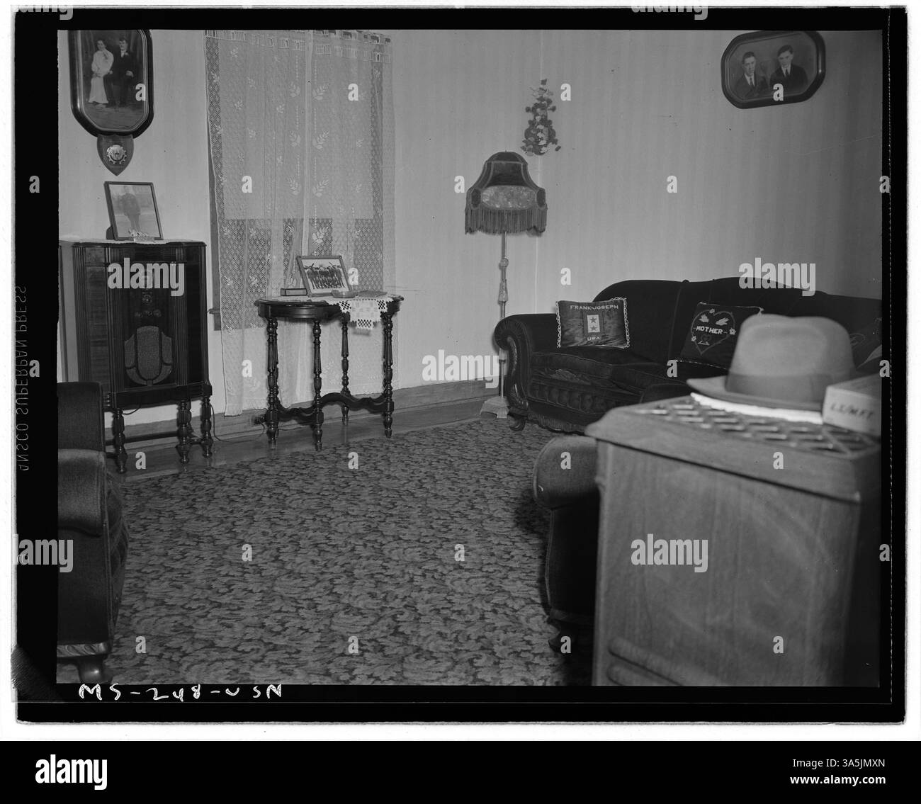 The living room in a home provided to a miner by H. C. Frick Coke ...