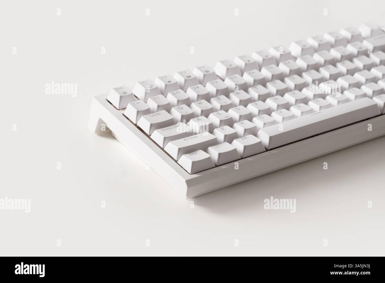 Modern white mechanical keyboard on white background. Custom build ...
