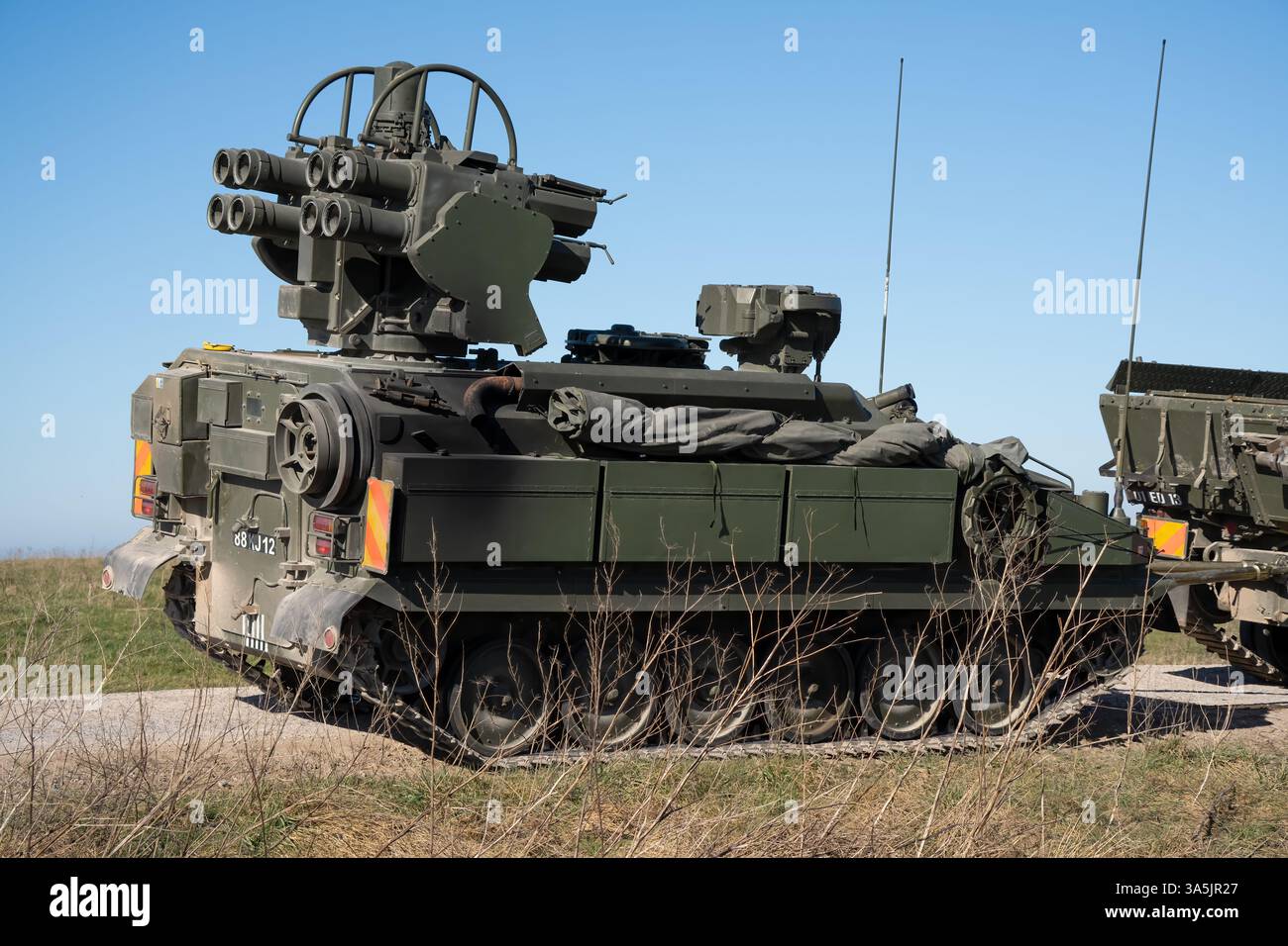 British Army Bulldog FV434 MRV towing a stricken Alvis Stormer ...