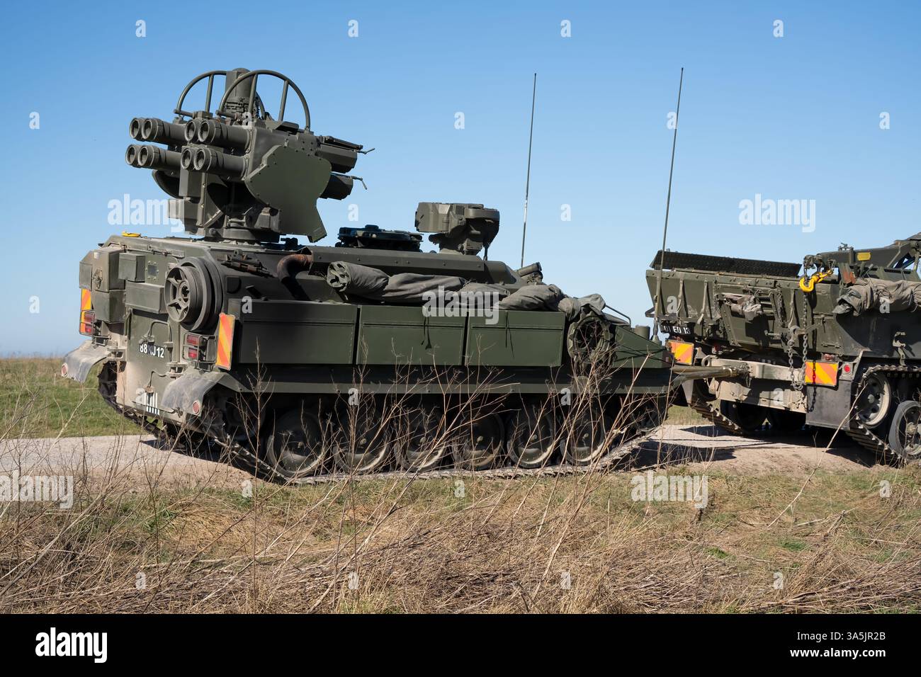 British Army Bulldog FV434 MRV towing a stricken Alvis Stormer ...