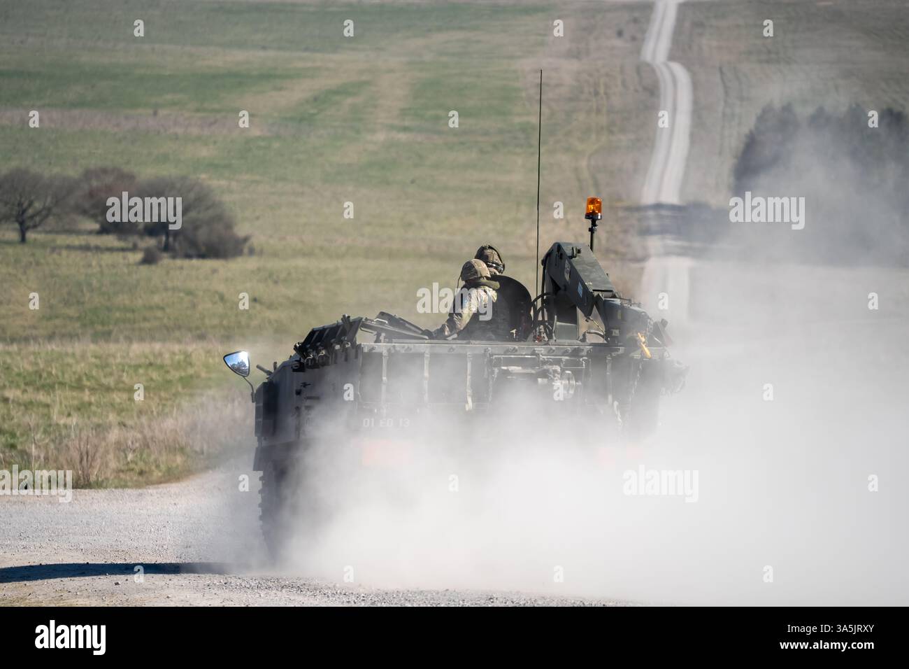 British army FV434 mechanized Armoured Repair Vehicle moving along a ...