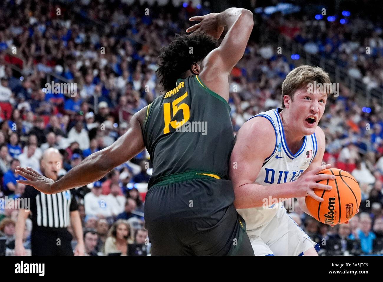 Duke guard Kon Knueppel drives to the basket past Baylor forward ...