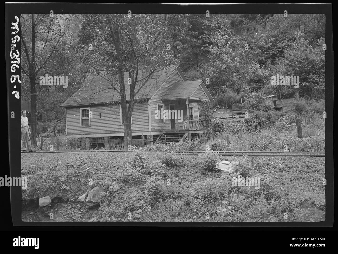 A typical house with a hog pen in the back, located at Ames Mining ...