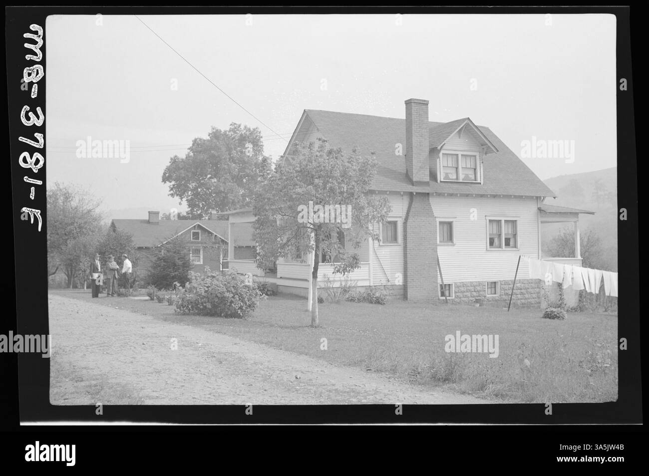 A photograph of a house located in a mining community, depicting the ...