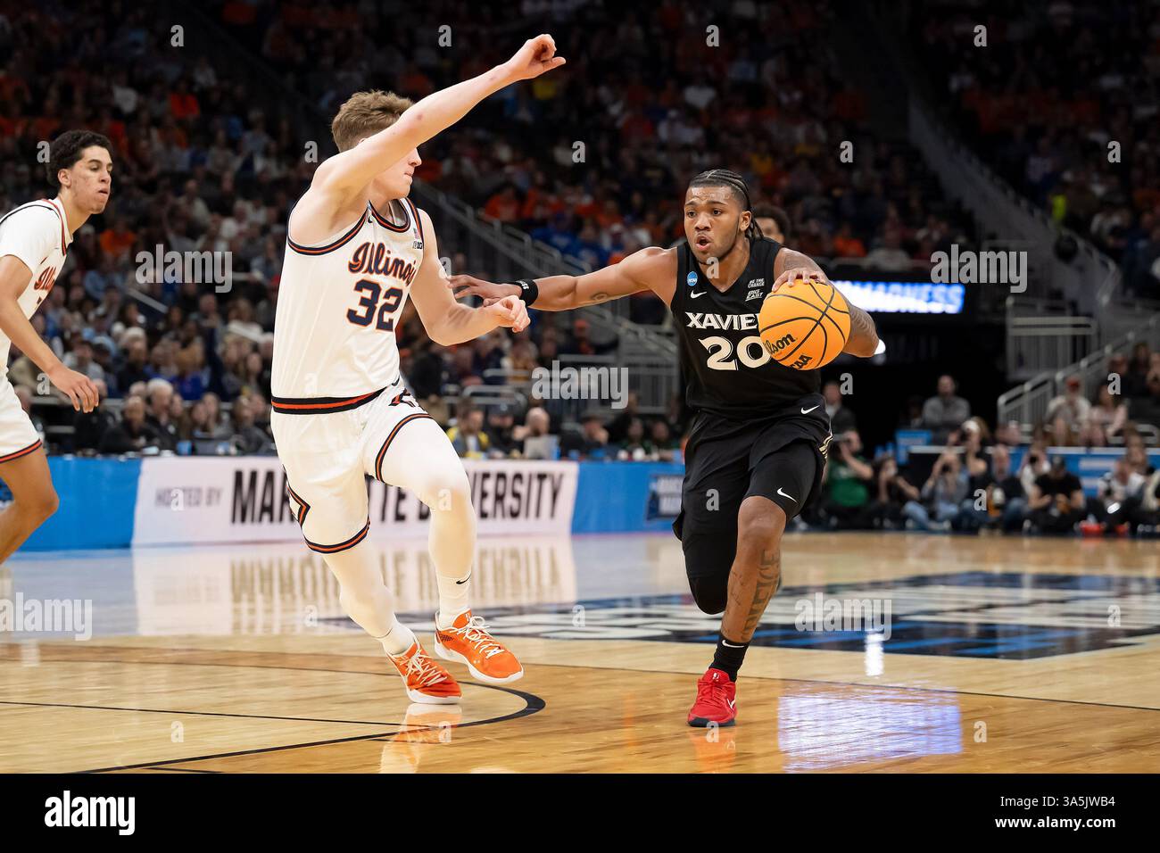 Milwaukee, WI, USA. 21st Mar, 2025. Xavier Musketeers guard Dayvion ...
