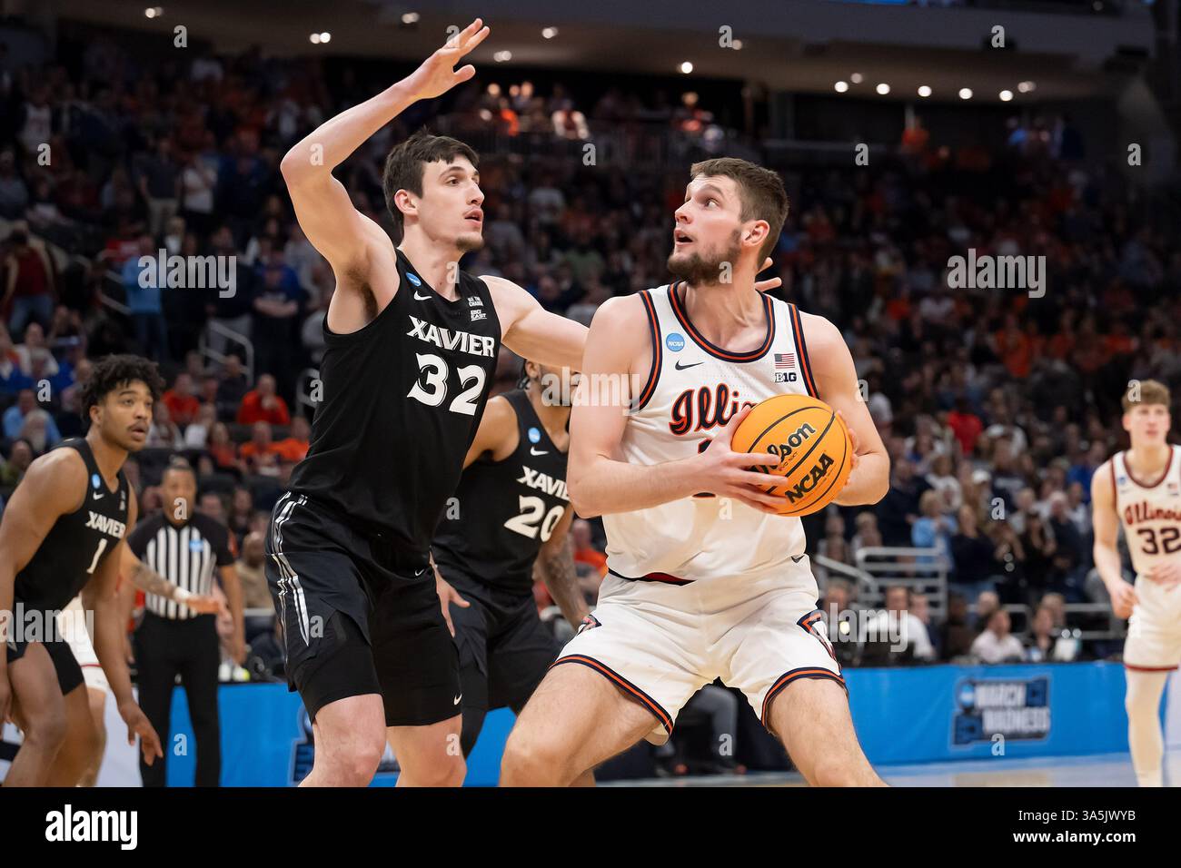 Milwaukee, WI, USA. 21st Mar, 2025. Illinois Fighting Illini center ...