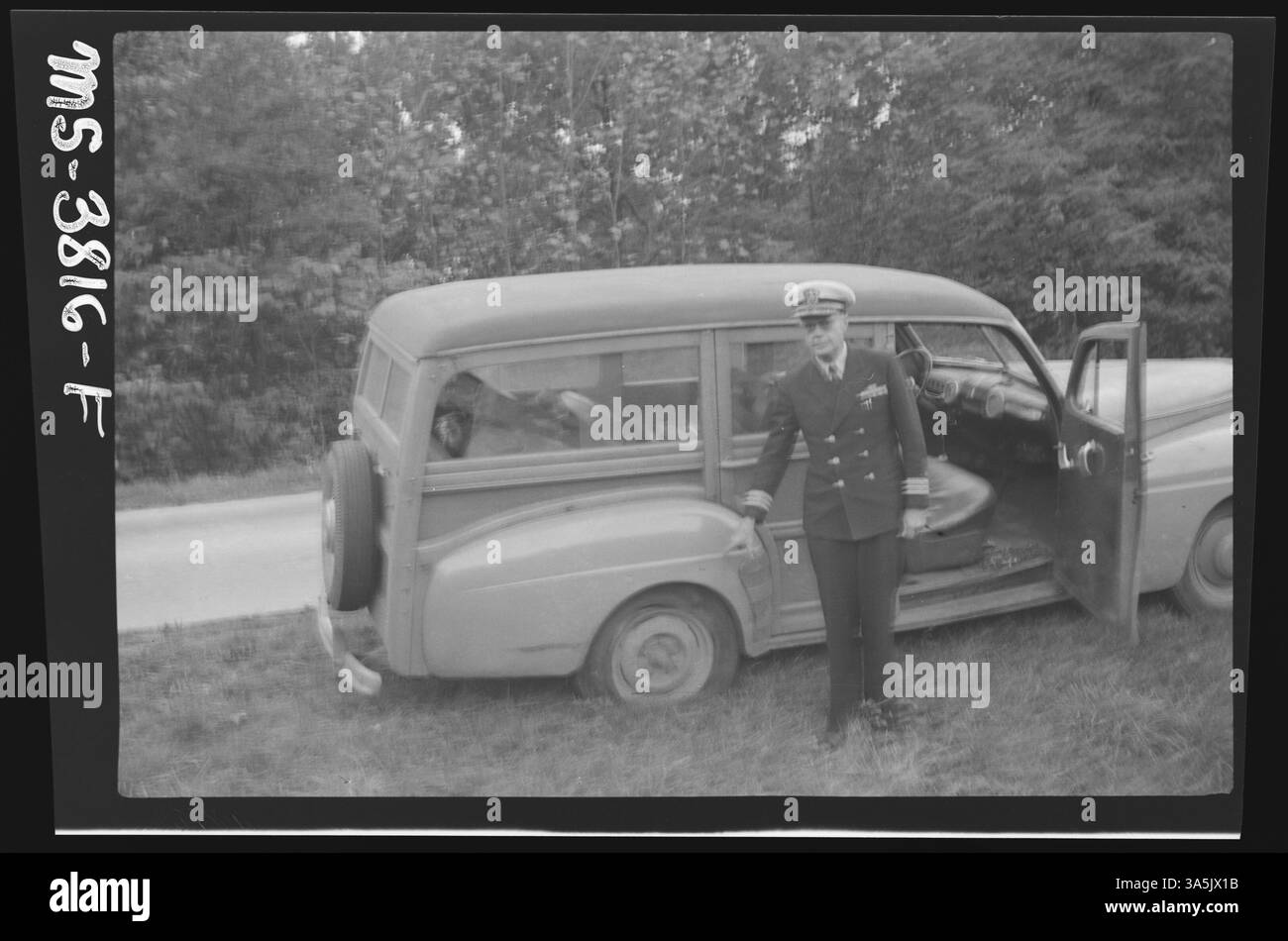 Formal attire stands Black and White Stock Photos & Images - Alamy