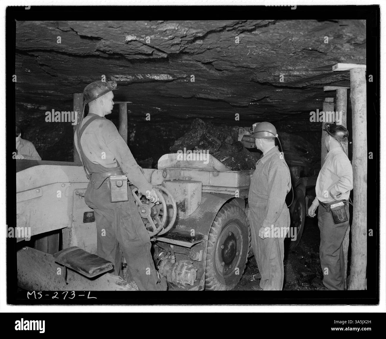 Rear Admiral Joel T. Boone observes the coal loading process at Consolidated Coal Company's Lake ...