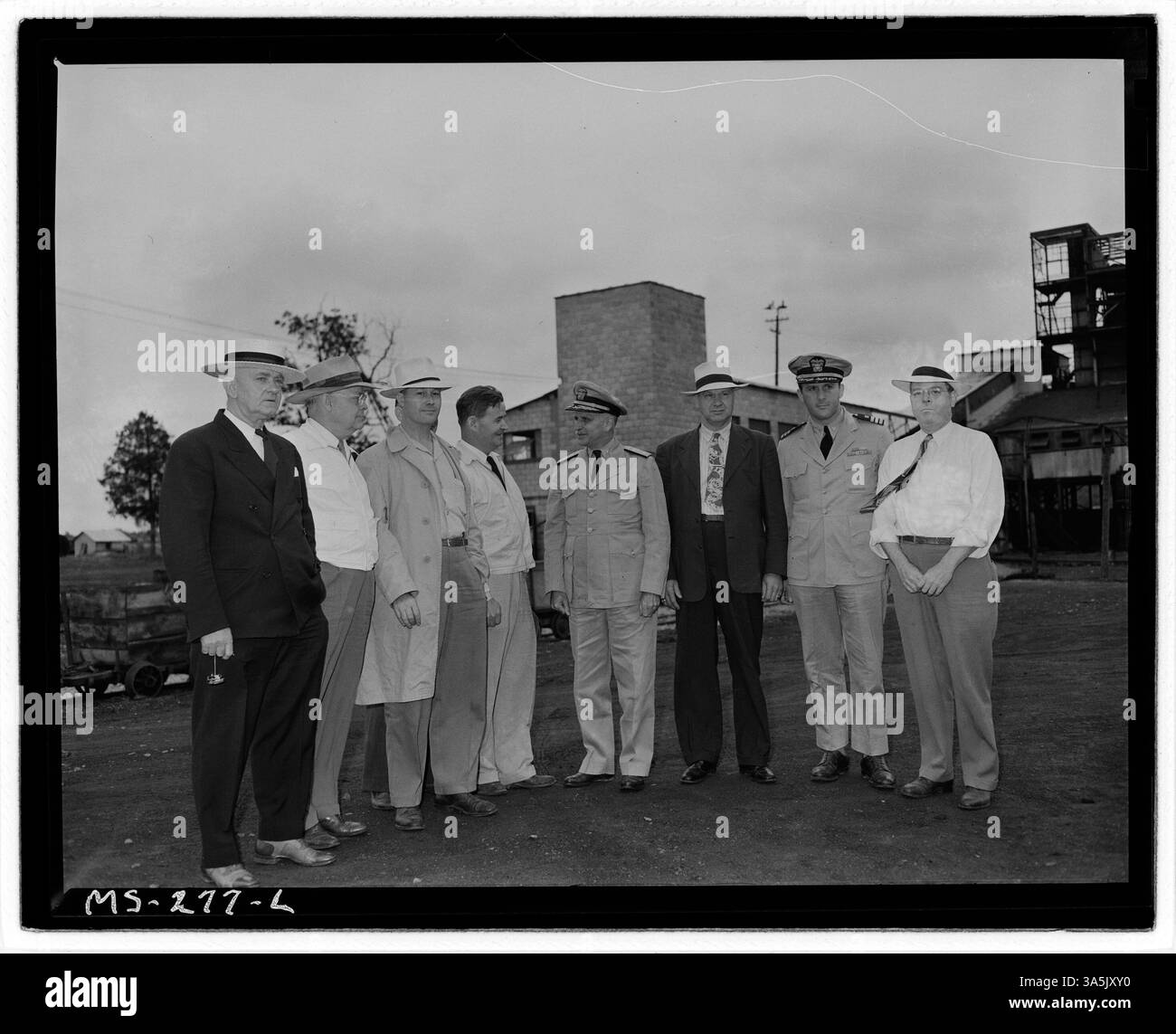 A group of industry leaders and mining officials, including L. T. Brock ...