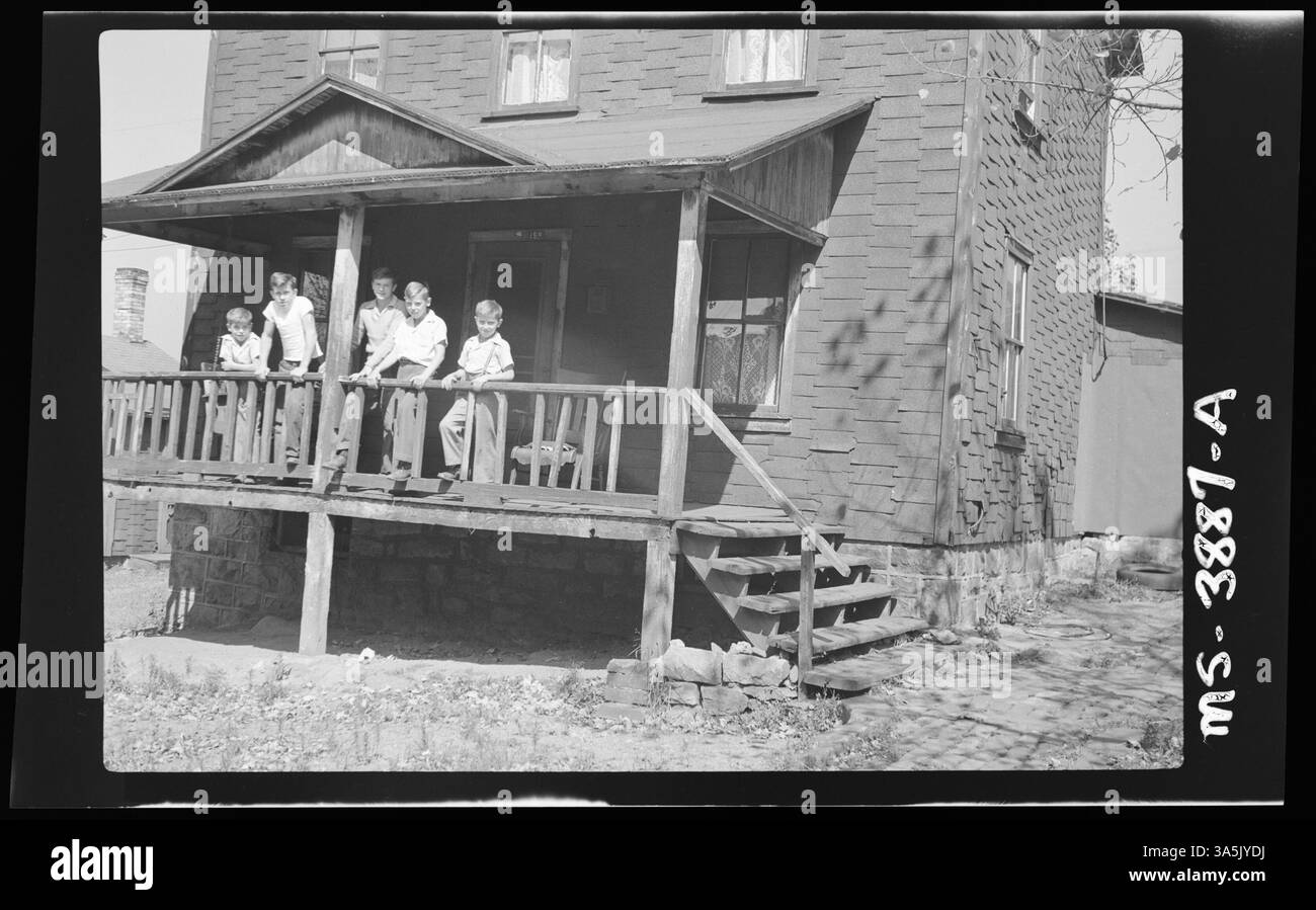 This 1946 photograph shows a miner’s family on the front porch of their ...