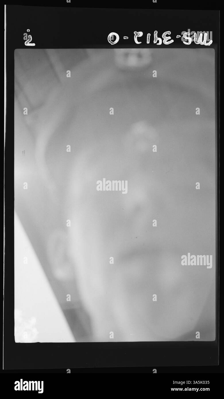 A close-up photograph of a man's face, possibly a miner, capturing the ...