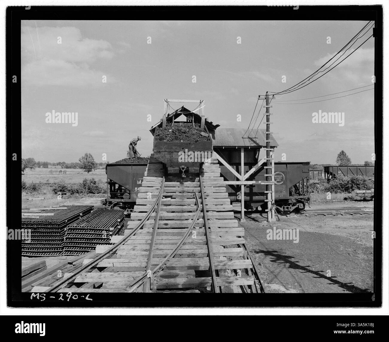 A shuttle car loaded with coal ascends an incline at the Wilkins-Biggs ...