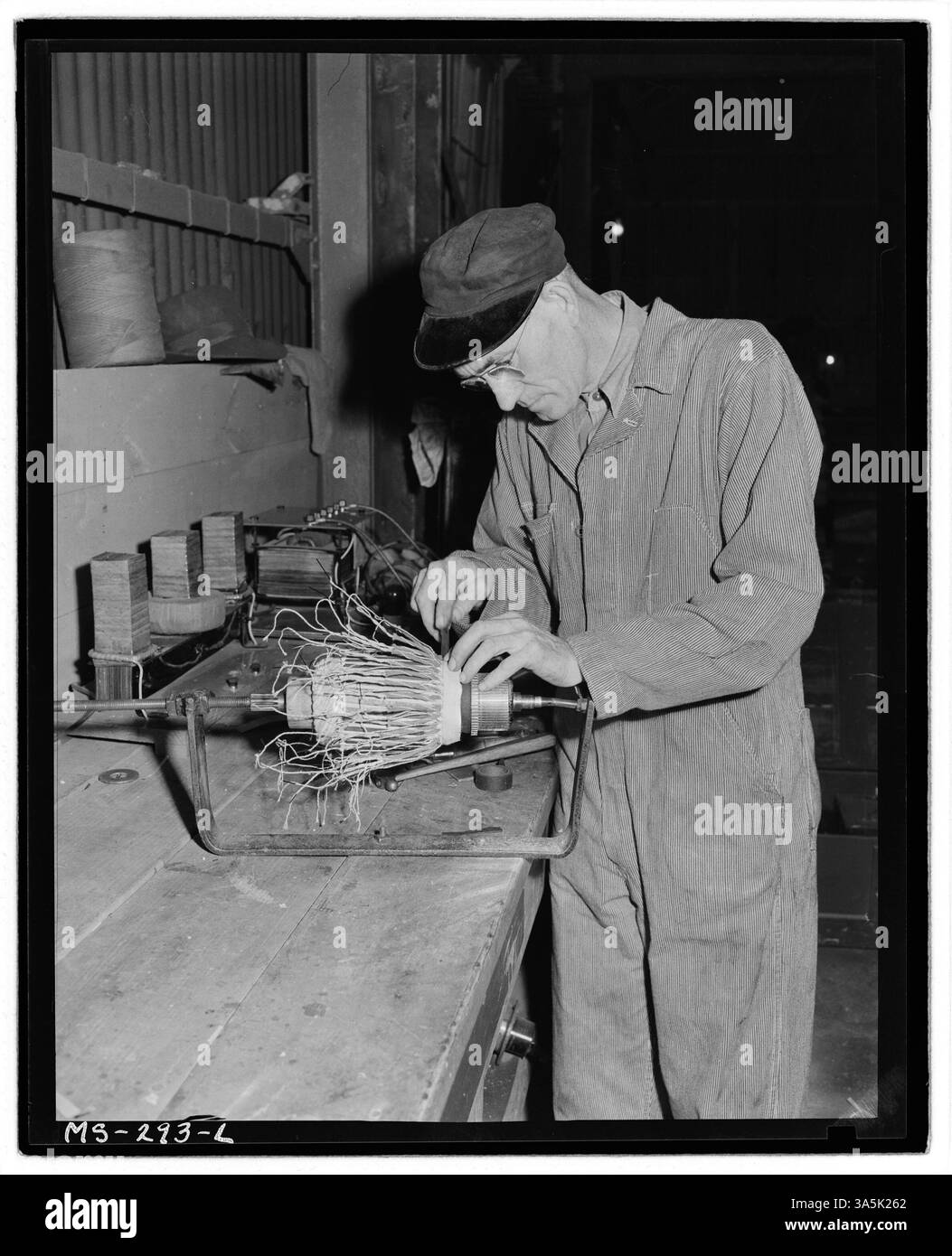 Alex Rockliff, from Sealeyville, Indiana, is rewinding the armature of ...