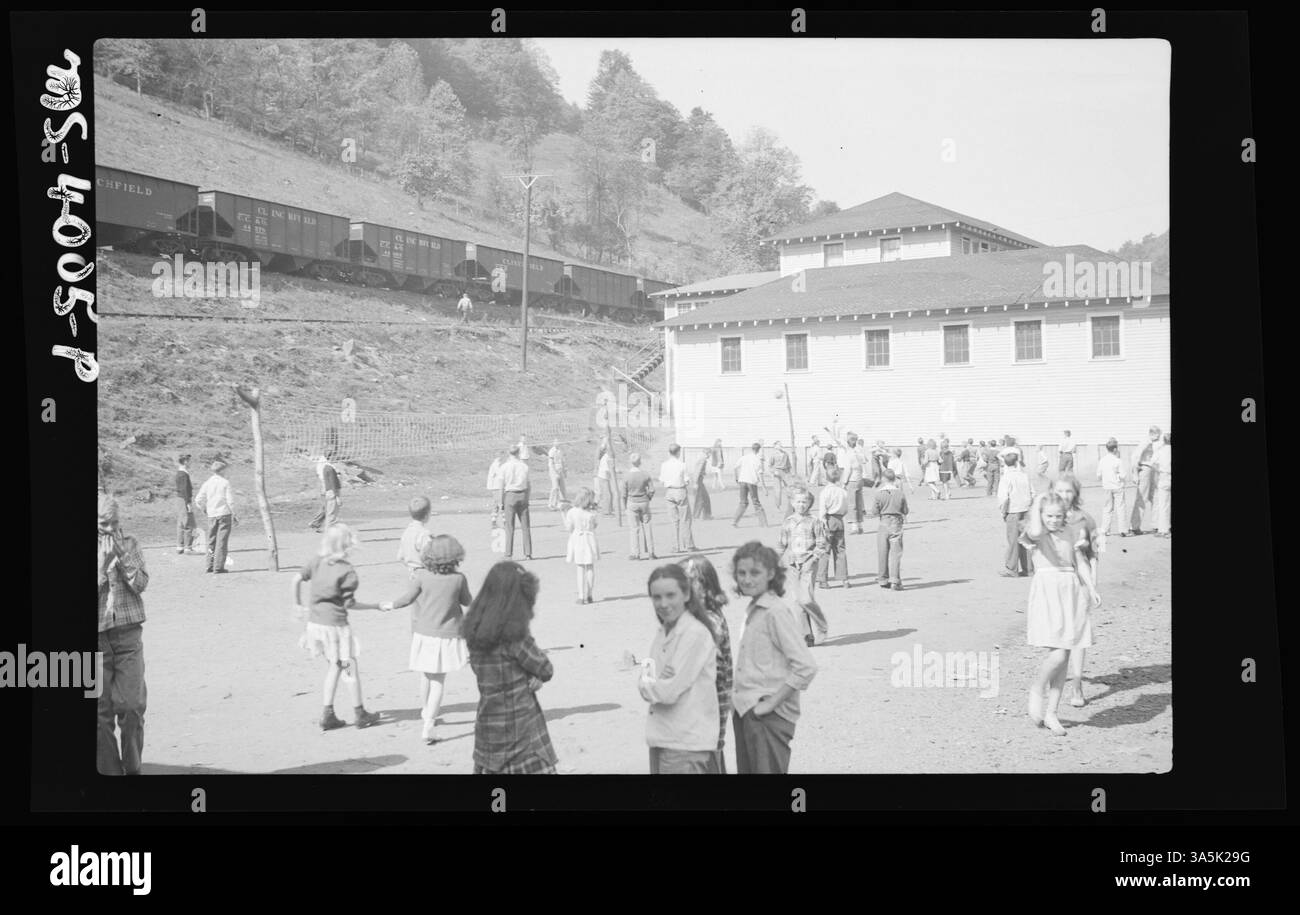 A view of the 'Play' area between the white school and the theatre at ...
