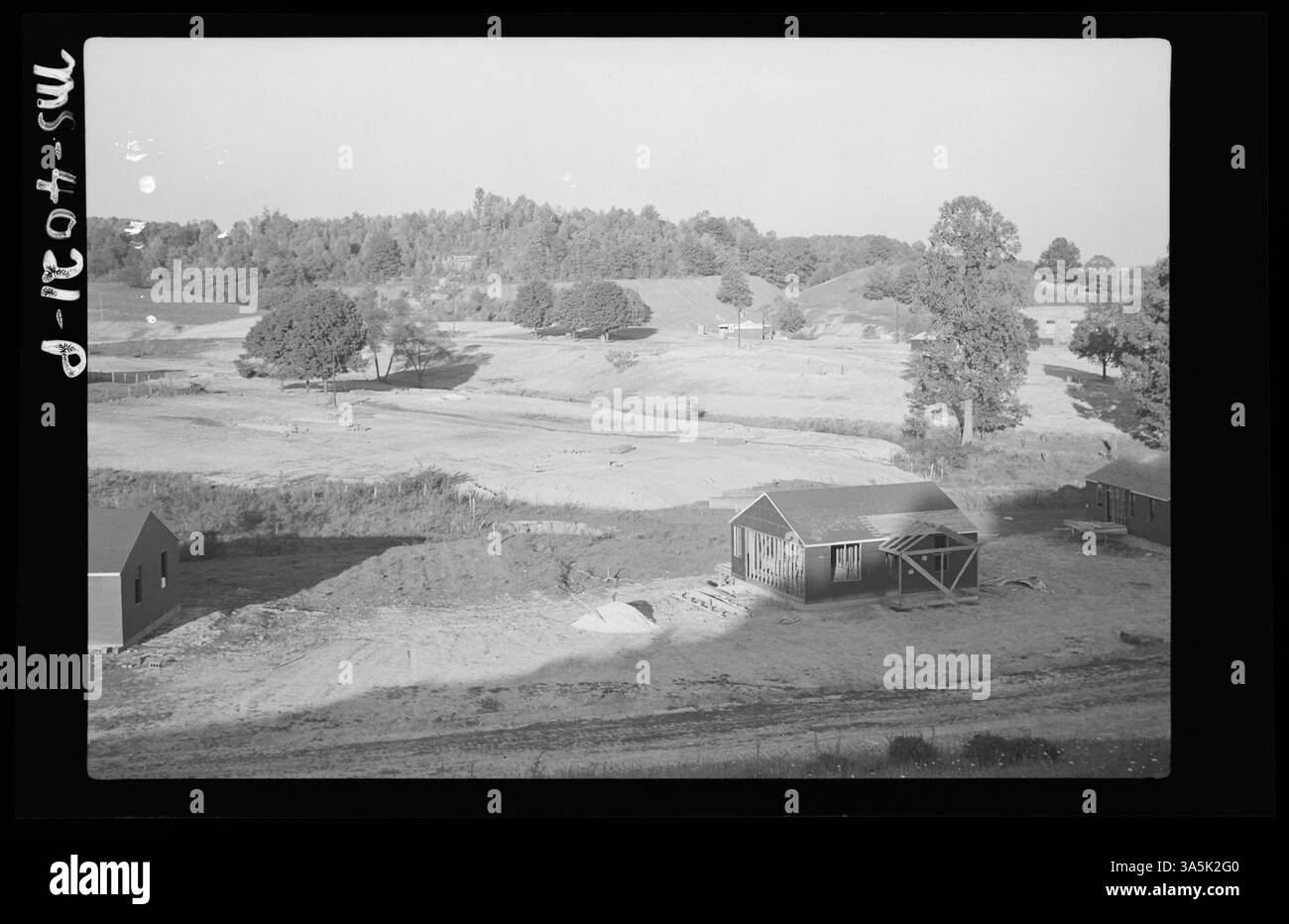 This photograph shows the construction of housing units on the upper ...