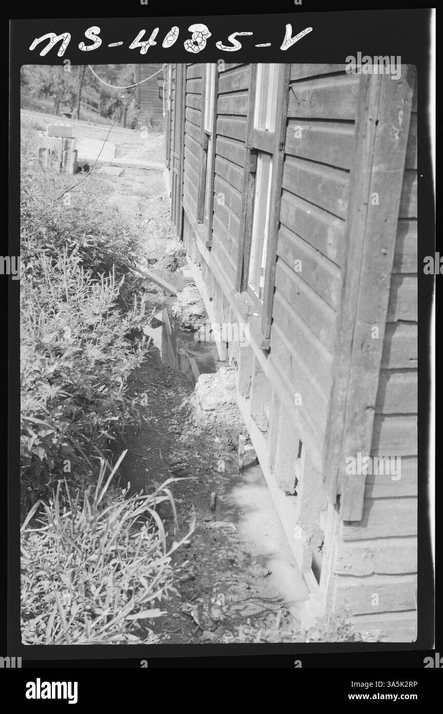 This 1946 photograph shows the dilapidated state of housing at Cosco ...