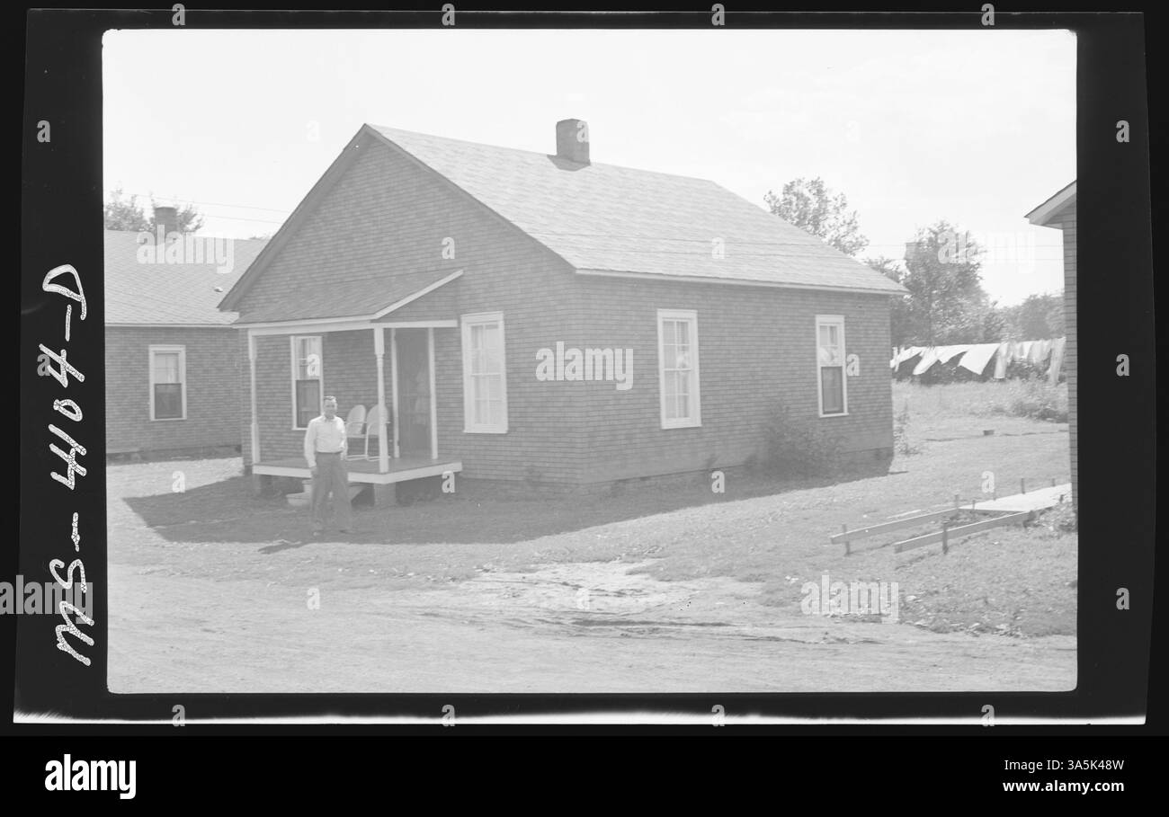 A photograph of former company housing now owned by individuals in ...