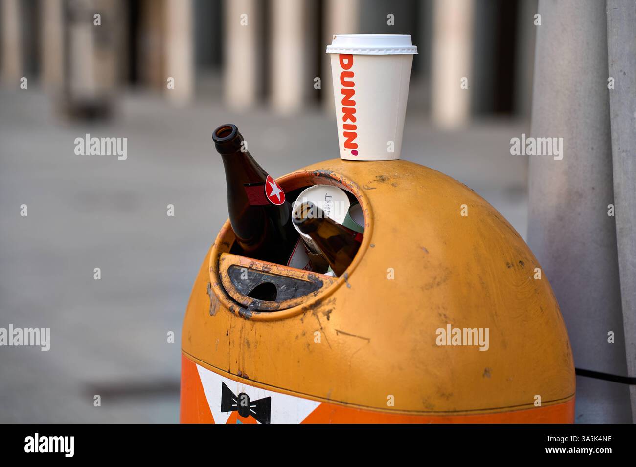 Berlin, Germany - March 23, 2025: An overflowing trash can in Berlin ...