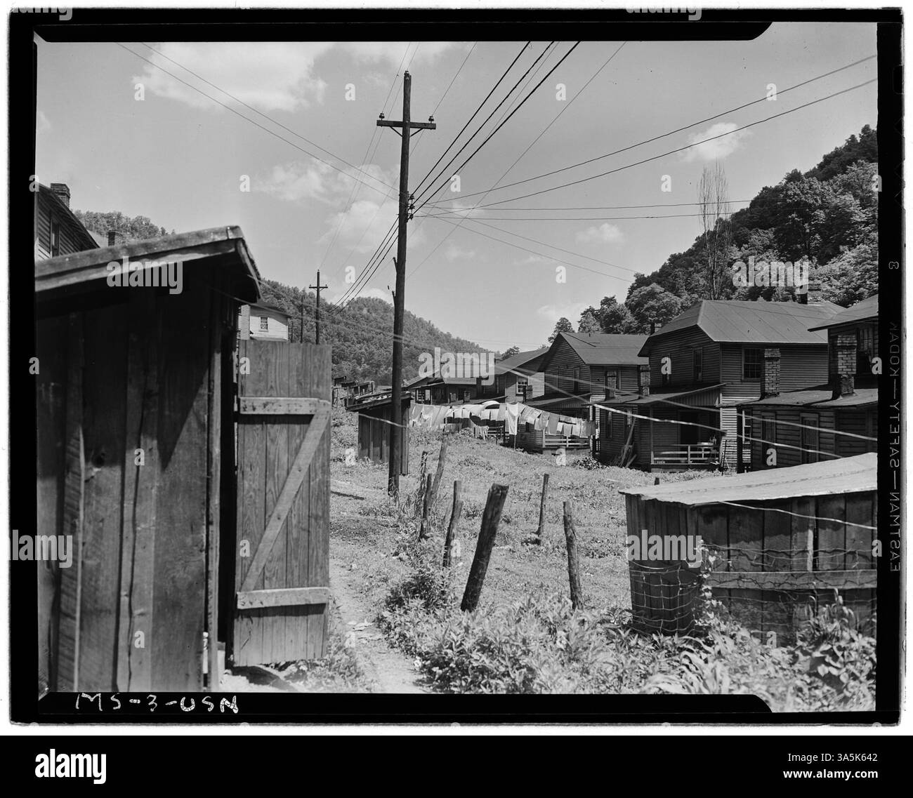 Backyards of homes in Weeksbury, Kentucky, showing the residential area ...