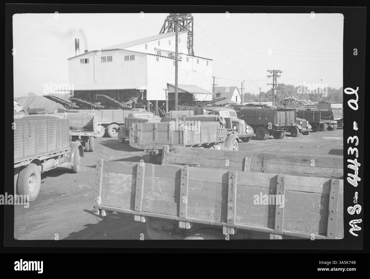 Trucks at a mine site in 1946, capturing the industrial scale of mining ...