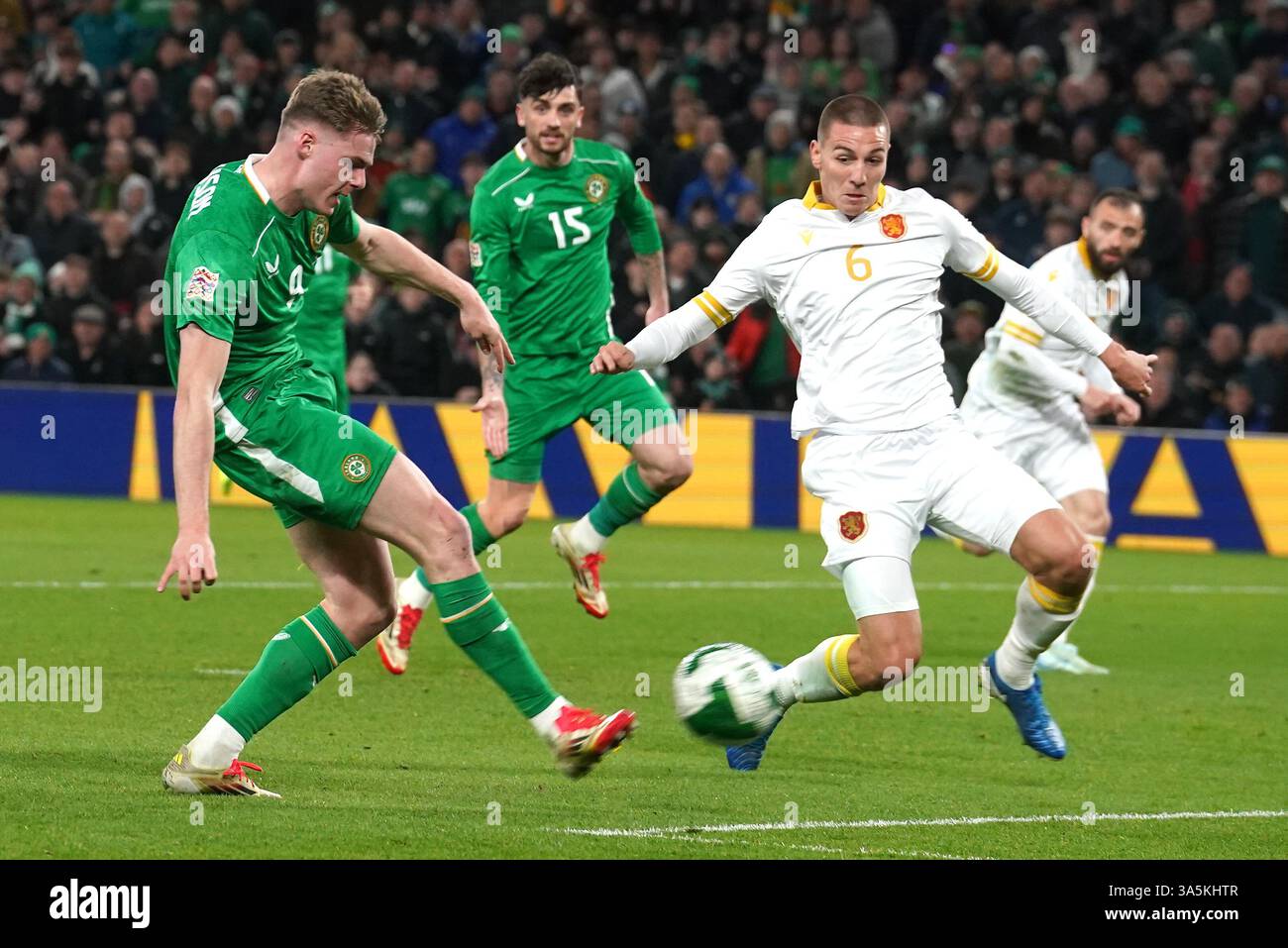 Republic of Ireland's Evan Ferguson (left) scores their side's first ...