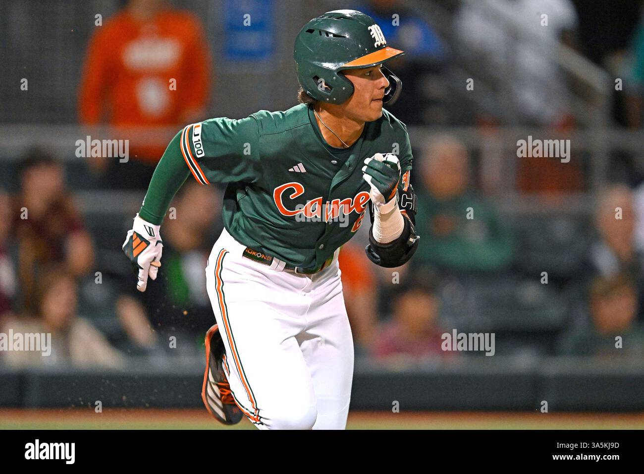 CORAL GABLES, FL - MARCH 22: Miami infielder Brandon DeGoti (6) runs to ...
