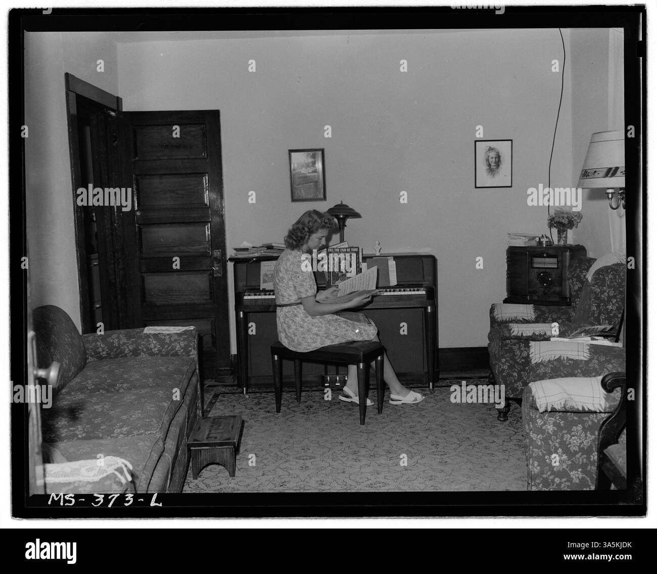 Living room inside a miner’s home at the company housing project for ...
