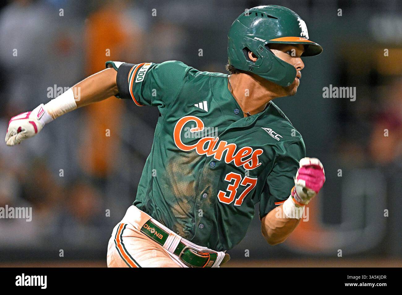 CORAL GABLES, FL - MARCH 22: Miami outfielder Fabio Peralta (37) runs ...