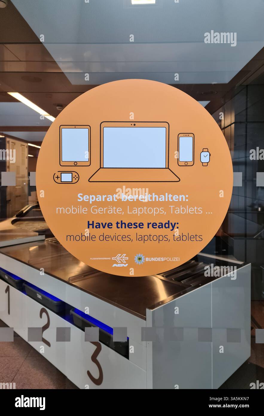 Hamburg, Germany 09. June 2024, Circular orange sign at Hamburg Airport ...