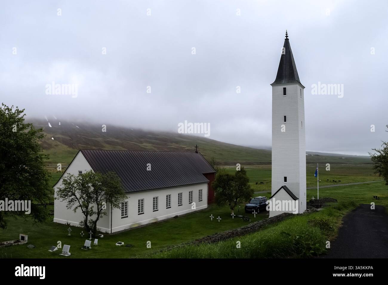 Holar, Iceland, 12. June 2024, White church and bell tower of Holar ...