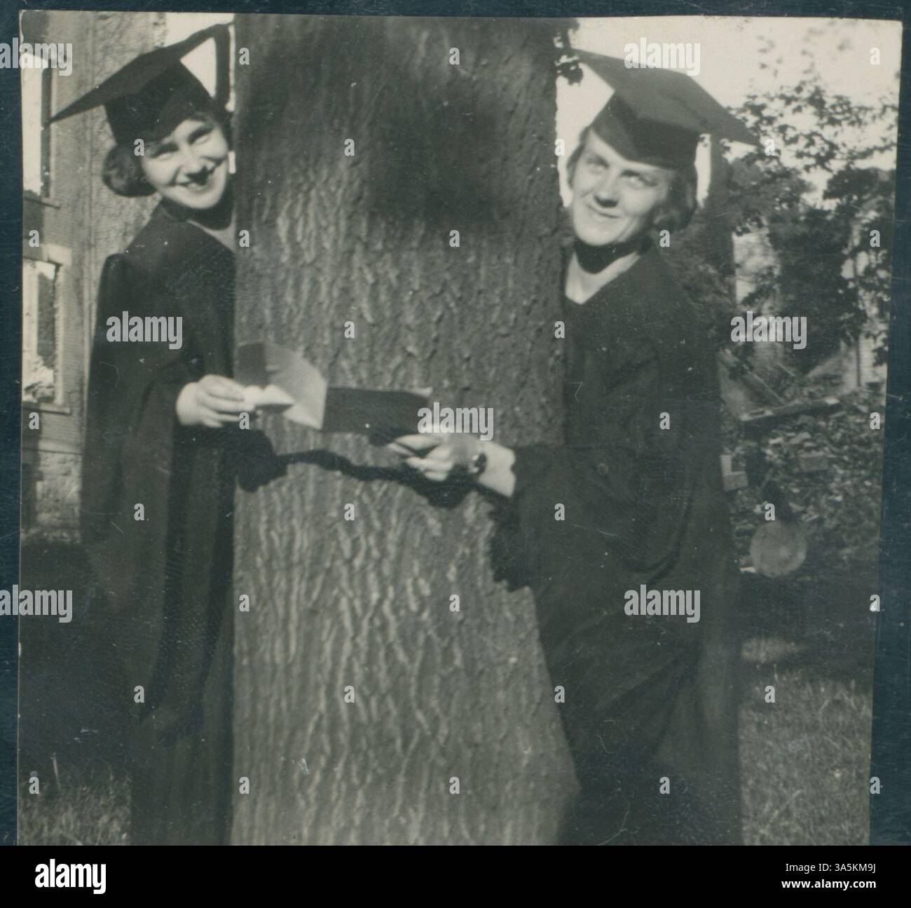 This image captures two women graduates from the 1922 commencement at ...
