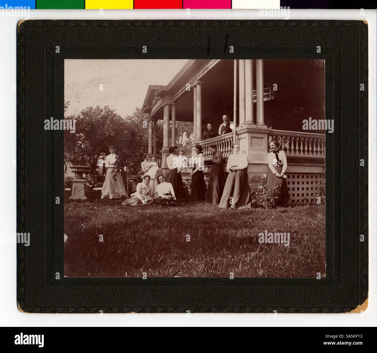 Group of family and friends gathered in front of the Troendle home on ...