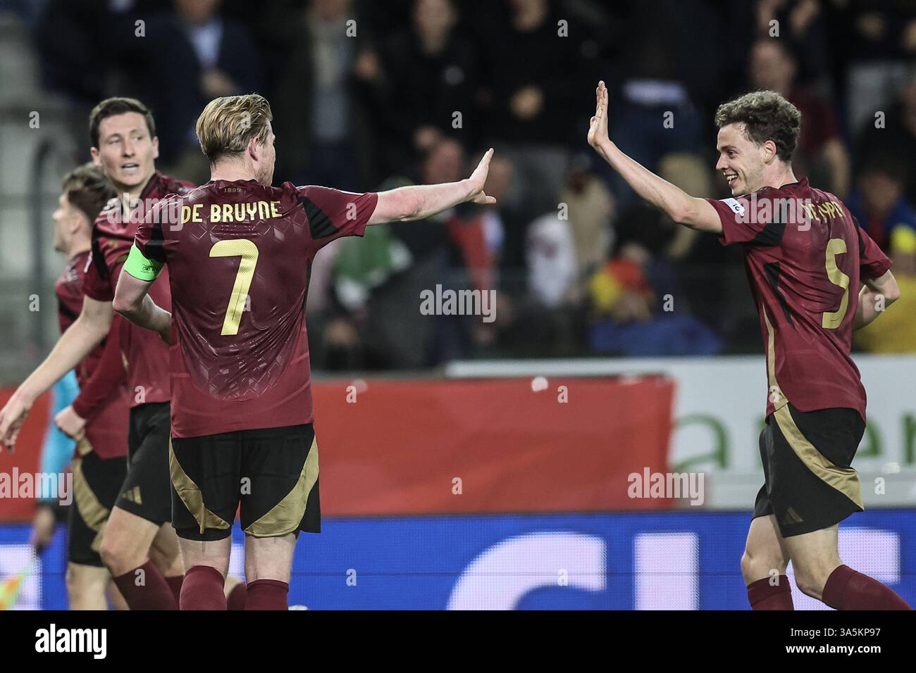 Genk, Belgium. 23rd Mar, 2025. Belgium's Kevin De Bruyne and Belgium's ...