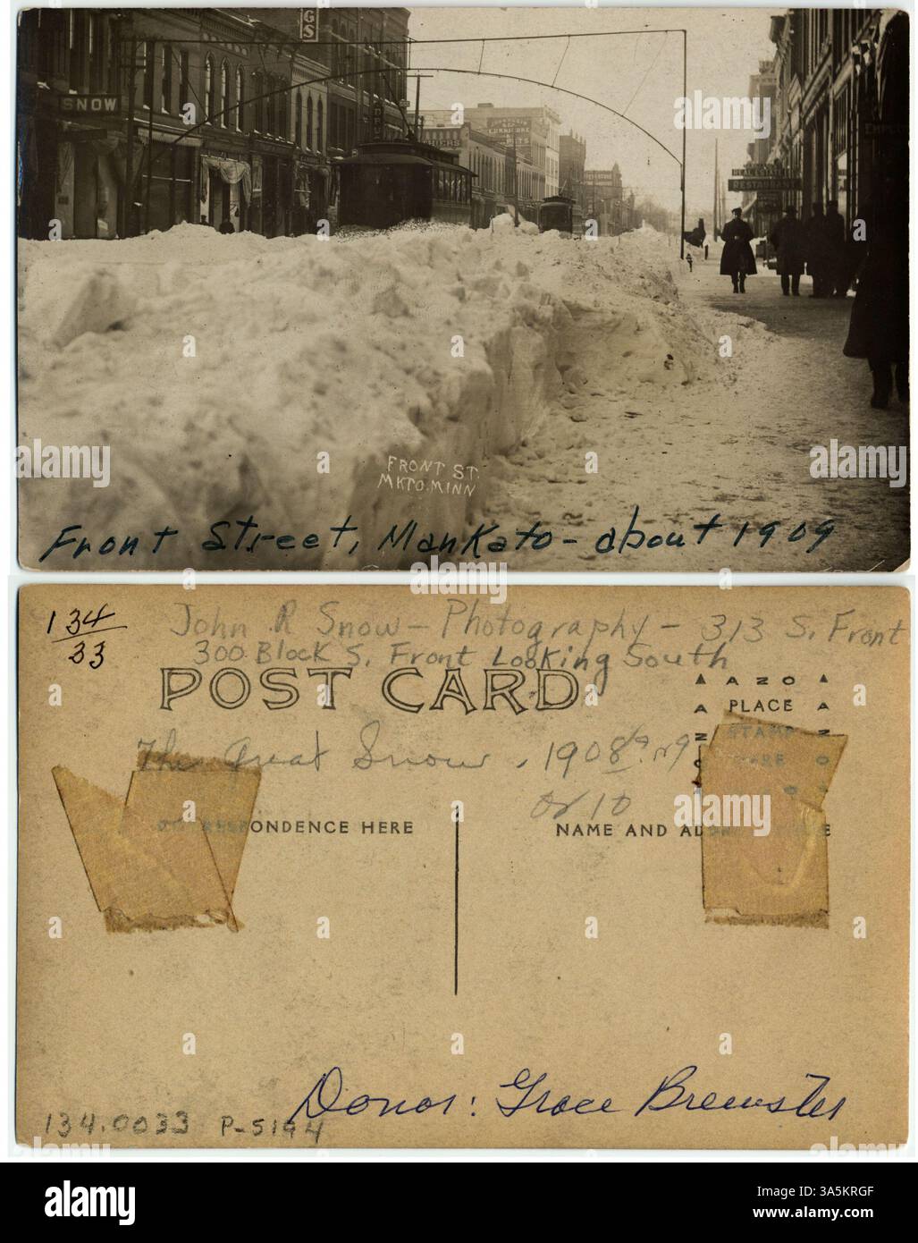 This image shows snow covering Front Street in Mankato, Minnesota, with ...