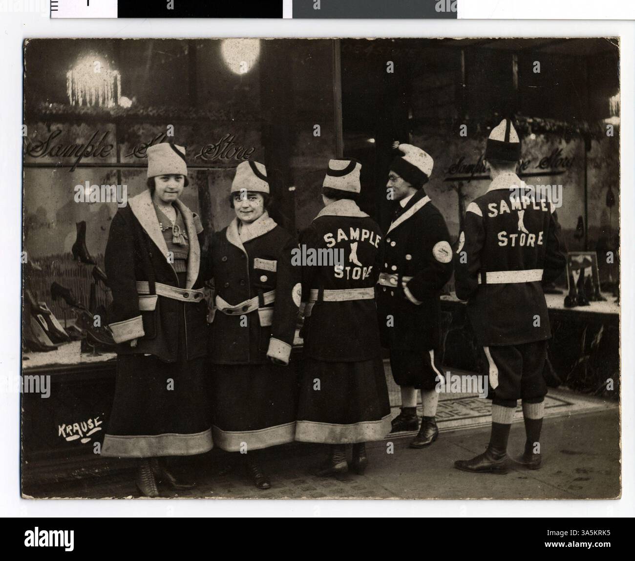 A photograph showing three women and two men, employees of the Sample ...
