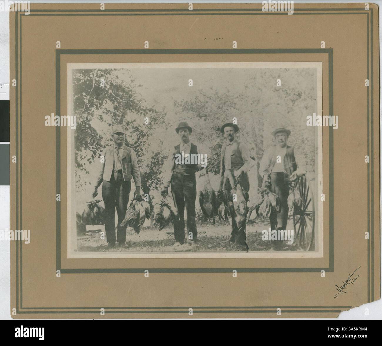 This image features four bird hunters from Blue Earth County, Minnesota ...