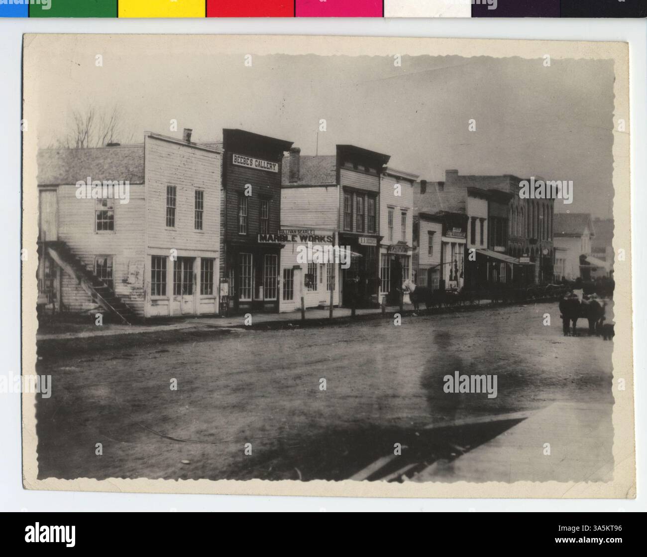 This image shows a view of the shops and stores along Front Street in ...