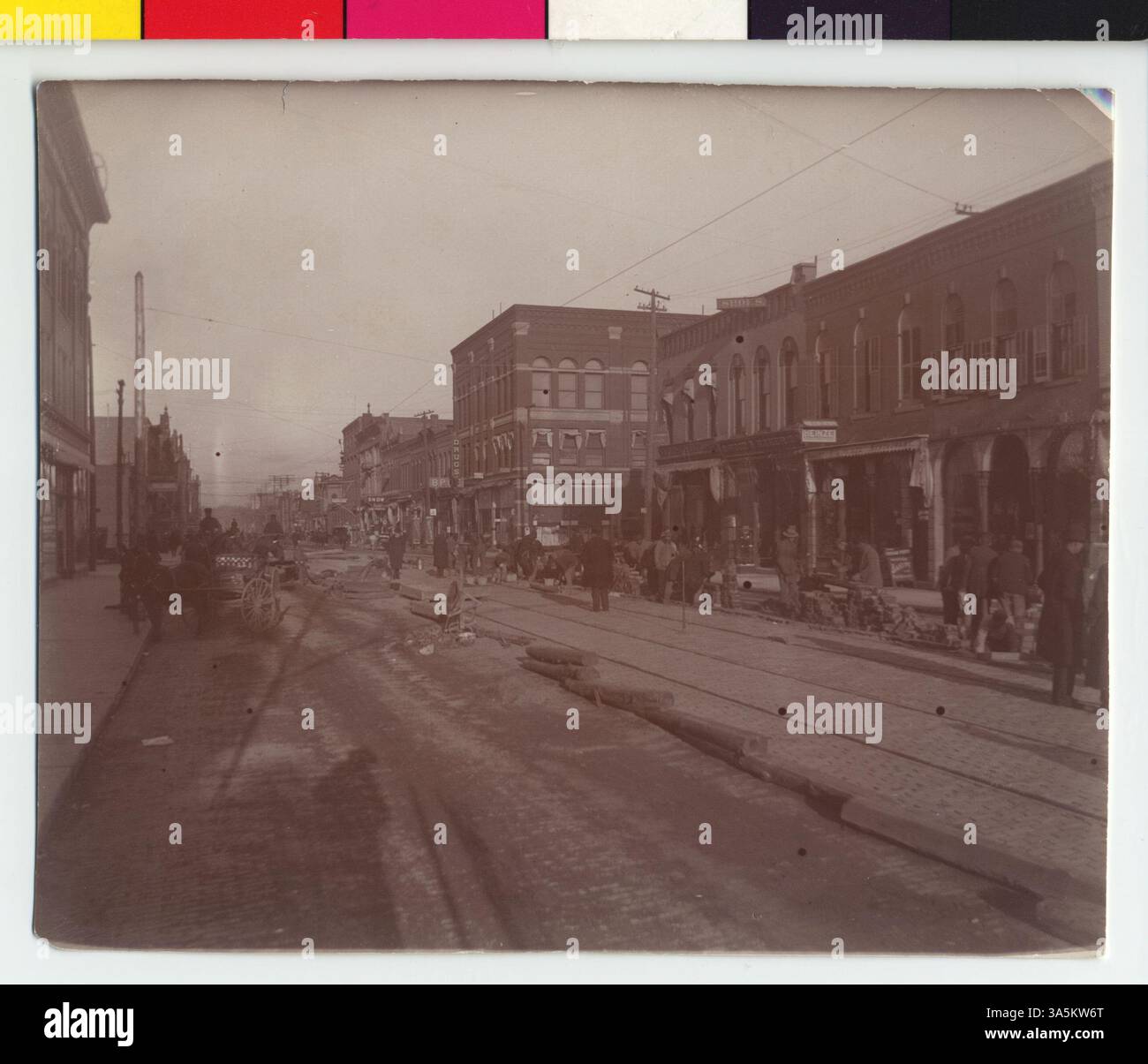This photo captures the process of laying streetcar tracks on Front ...
