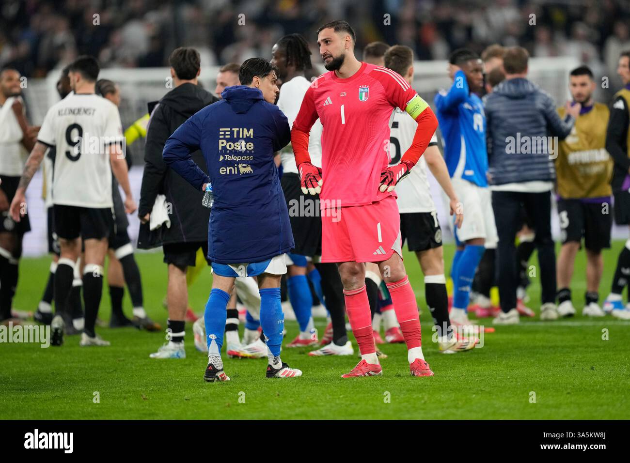 Italy's players react after the Nations League quarterfinal second leg ...