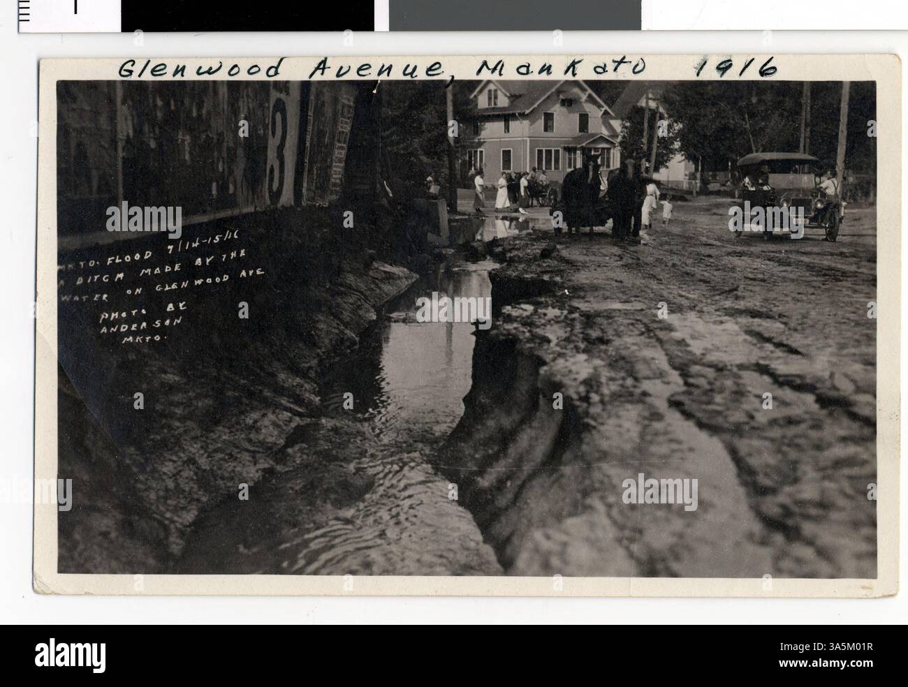 A view of the erosion caused by floodwaters on Glenwood Avenue in ...