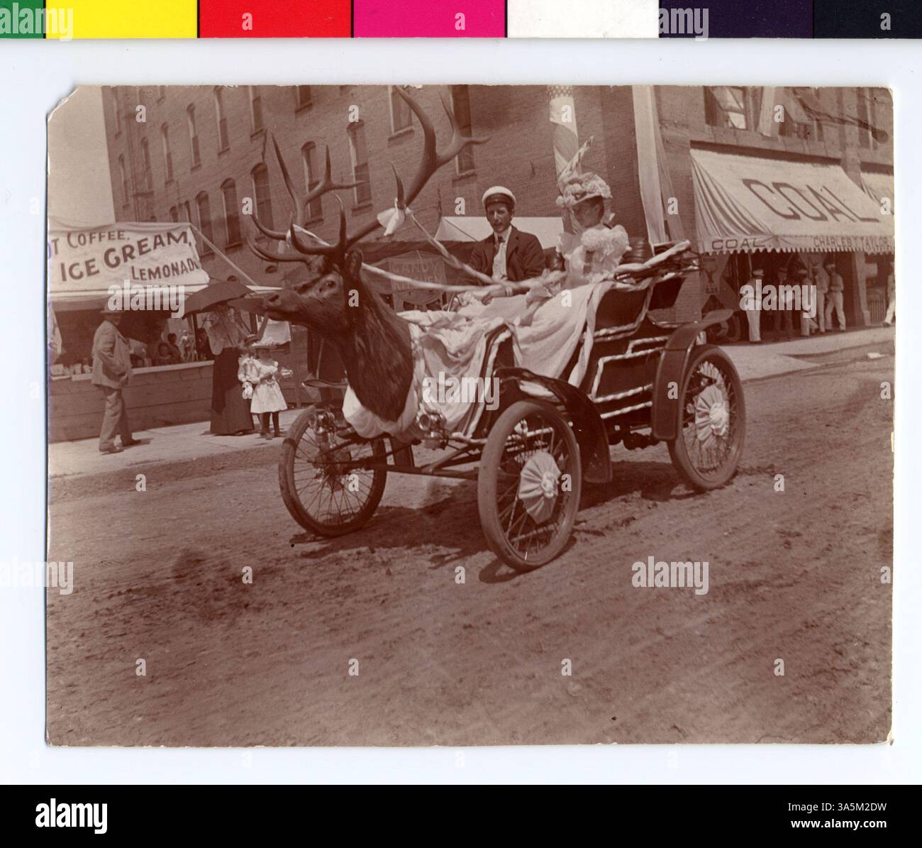 The Elks on Parade in Mankato features an early automobile with an elk ...